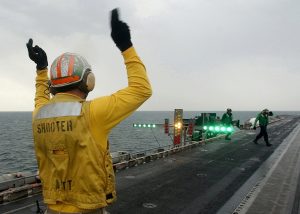 Decoding the Hand Signals of Aircraft Carrier Operations