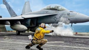 Decoding the Hand Signals of Aircraft Carrier Operations