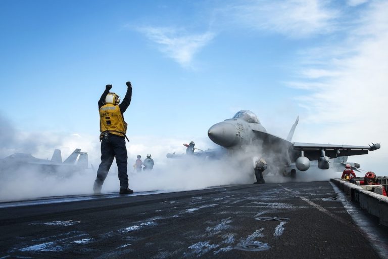 Decoding the Hand Signals of Aircraft Carrier Operations