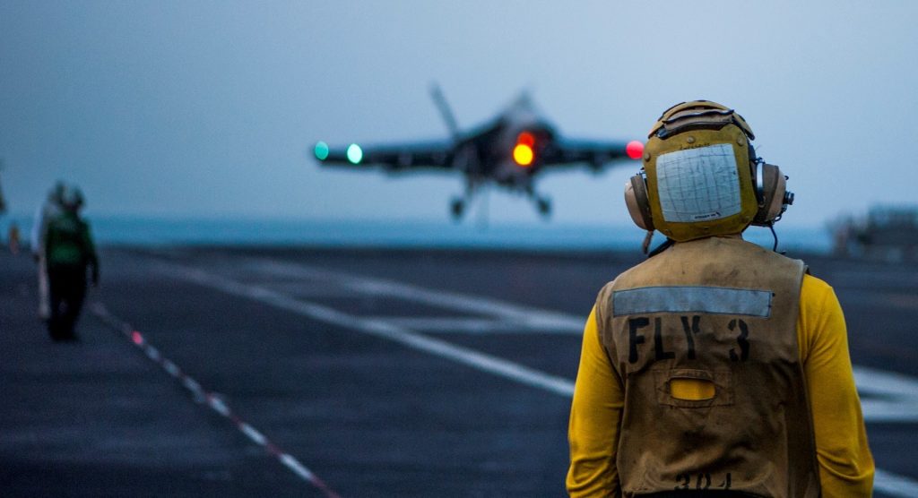 Decoding the Hand Signals of Aircraft Carrier Operations